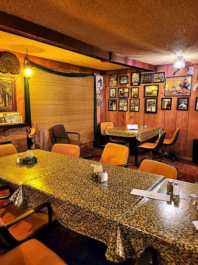 Vintage wood paneling and patterned tablecloths create that perfect time-capsule atmosphere where you half expect to see Al Capone nursing a drink in the corner.
