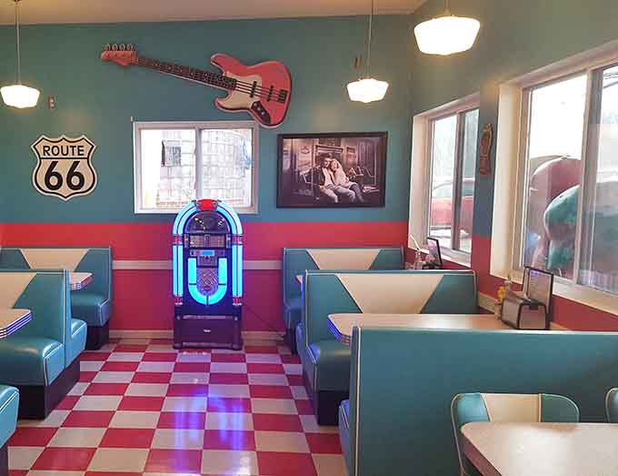 Step inside where chrome meets turquoise, vinyl booths meet checkered floors, and the 1950s never got the memo about ending.