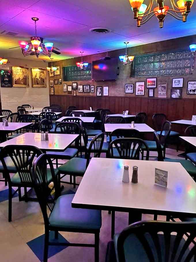 Vintage chandeliers cast a warm glow over formica tables, creating an atmosphere where time stands still and pizza memories are made.