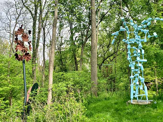 These blue abstract figures look like they're having a conversation about the meaning of art, or maybe just lunch plans.