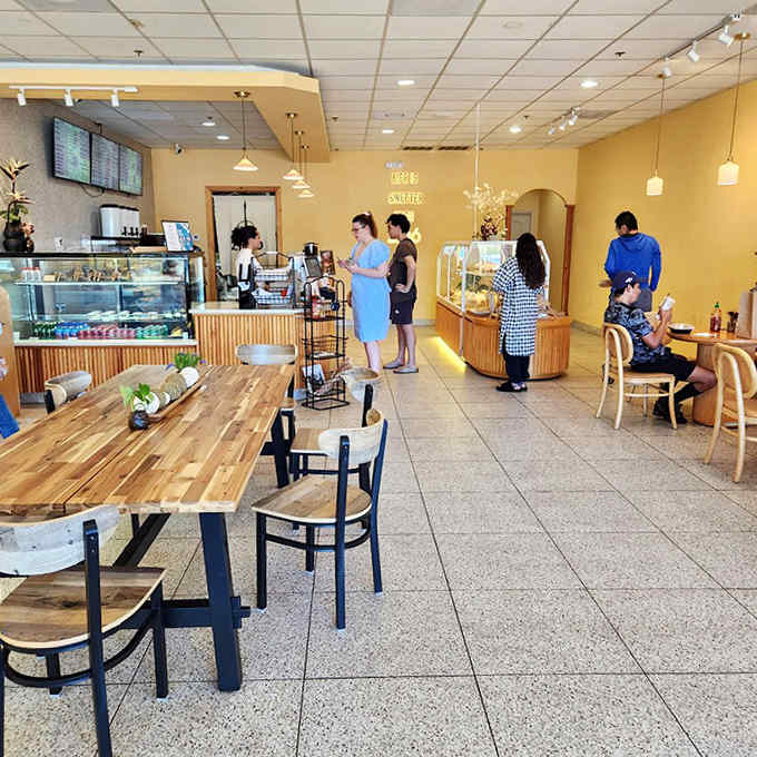 Warm yellow walls and wooden tables create the perfect backdrop for the flavor explosion that awaits. Simplicity with purpose!