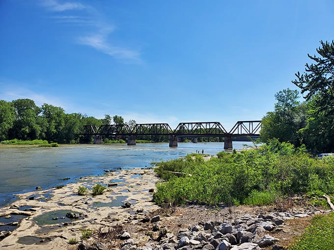 This wooden covered bridge isn't just Instagram-worthy, it's a time machine to when craftsmanship mattered and "rush hour" meant horses getting impatient.