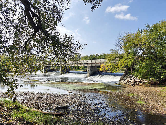 This historic dam and bridge combo looks like something from a postcard, proving that 19th-century engineers knew how to build functional structures that also happened to be gorgeous.