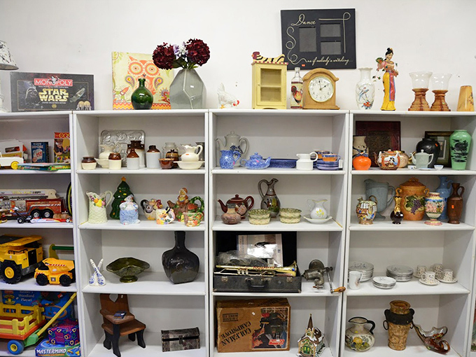 Shelves lined with vintage collectibles tell stories of bygone eras &ndash; each teapot and figurine waiting for its second act.