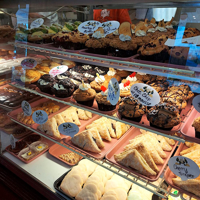 A pastry paradise awaits behind glass &ndash; each tray a testament to the art of baking with handwritten labels adding homespun charm.