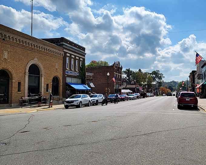 Main Street buzzes with a gentle energy as visitors and locals mingle under the watchful gaze of beautifully preserved 19th-century architecture.