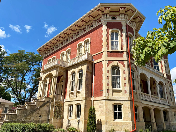 Architectural swagger on full display – those limestone quoins and ornate cornices aren't just showing off, they're telling stories of 19th-century craftsmanship.