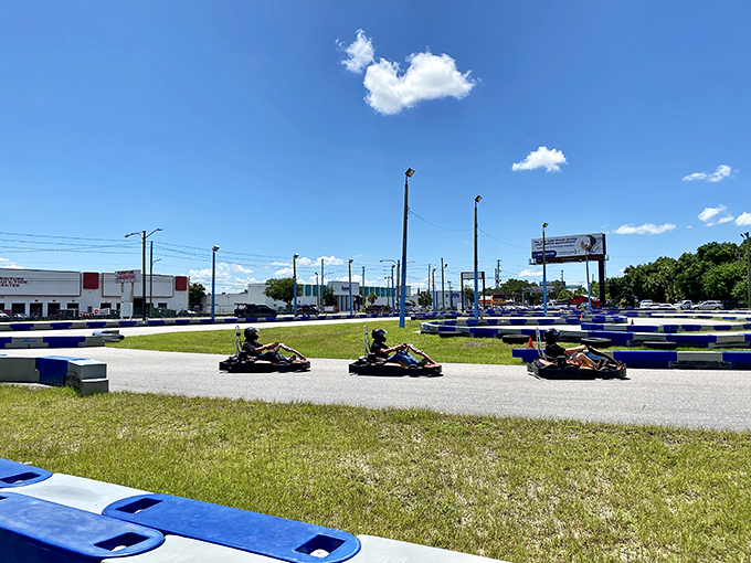 Under Florida's brilliant blue skies, drivers navigate the challenging outdoor circuit, testing their skills against both the track and each other.