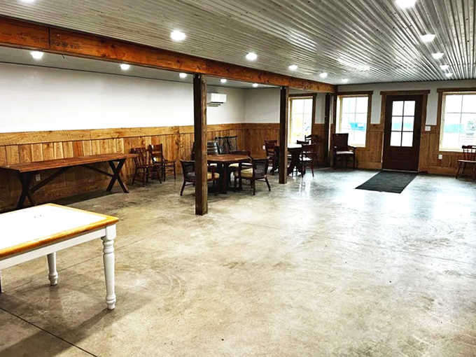 Rustic meets refined in this spacious interior where metal ceilings and wooden beams create a perfect harmony of old and new.