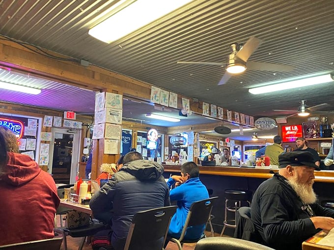 Inside, the no-frills dining area buzzes with conversation as locals and visitors gather around tables, united by their love of fresh Gulf seafood.
