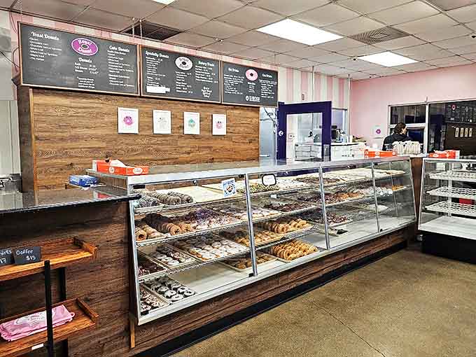 Display cases that would make Willy Wonka jealous showcase an array of hand-crafted pastry perfection waiting to be boxed up.