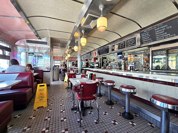Step inside and travel back to the 1950s &ndash; red vinyl booths, chrome accents, and checkerboard floors create the quintessential American diner experience.