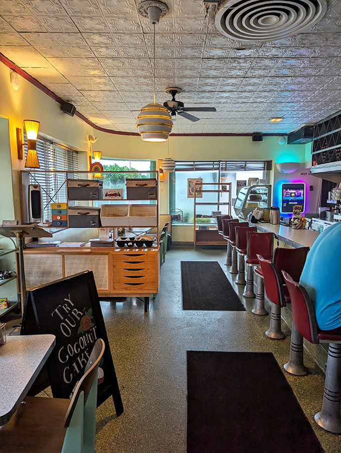Step inside and travel back in time with vintage ceiling tiles, classic counter seating, and an atmosphere that whispers stories from decades past.