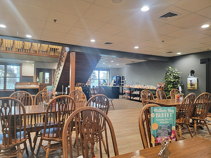 Wooden Windsor chairs and warm lighting create that "grandma's dining room" feel, only grandma never had seating for 200 of her closest friends.