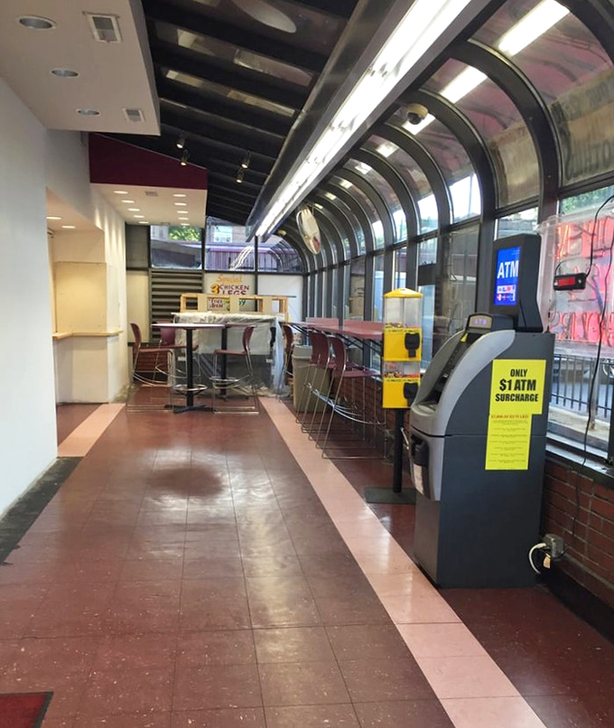The distinctive curved window seating area offers the perfect perch for donut contemplation and people-watching.