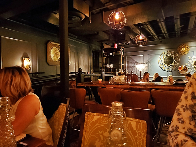 Amber lighting and leather seating create the perfect atmosphere for clandestine conversations and exceptional cocktails.