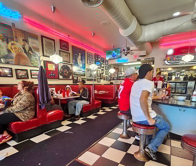 Step inside to a symphony of red vinyl booths, chrome accents, and checkerboard floors &ndash; the holy trinity of authentic American diner design.