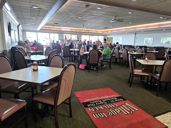 The spacious dining room buzzes with conversation and anticipation as diners gather for what many consider Ohio's finest fried chicken experience.