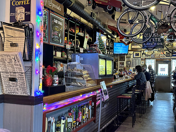 Step inside to a collector's paradise where vintage memorabilia covers every surface and multicolored lights create an atmosphere that's equal parts nostalgic and festive.