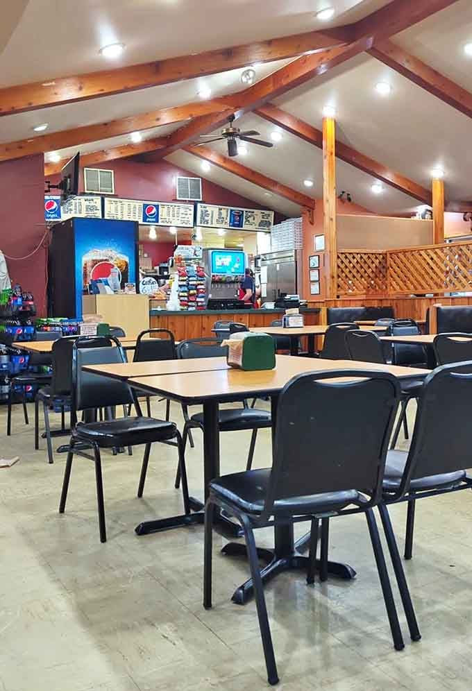 Interior: Warm wooden beams and simple furnishings create the perfect backdrop for the real star&mdash;pizza that'll make you forget your table manners.