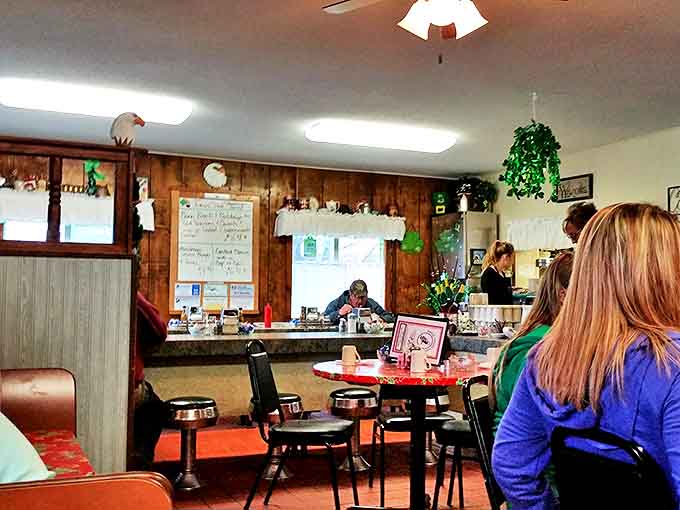 Wood-paneled walls and cozy seating create that "grandma's kitchen" feeling where calories somehow don't count and time slows down.