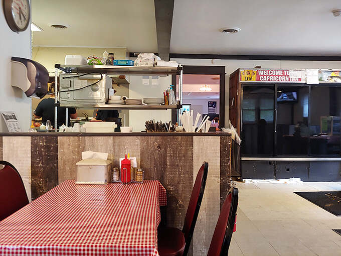 Classic diner simplicity with red-checkered tablecloths and wood paneling &ndash; where calories don't count and conversations flow as freely as the coffee.