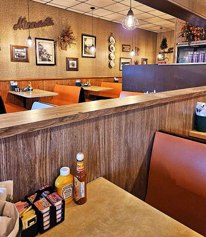 Warm wood paneling and Minnesota memorabilia create a cozy atmosphere where conversations flow as freely as the coffee.