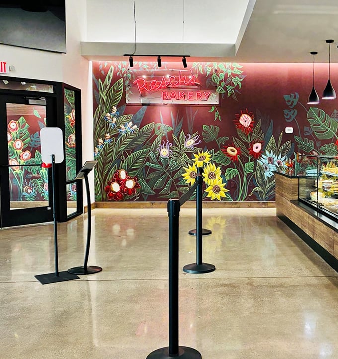 Step inside to a floral wonderland &ndash; this vibrant mural sets the stage for the artistic creations waiting in the display cases.