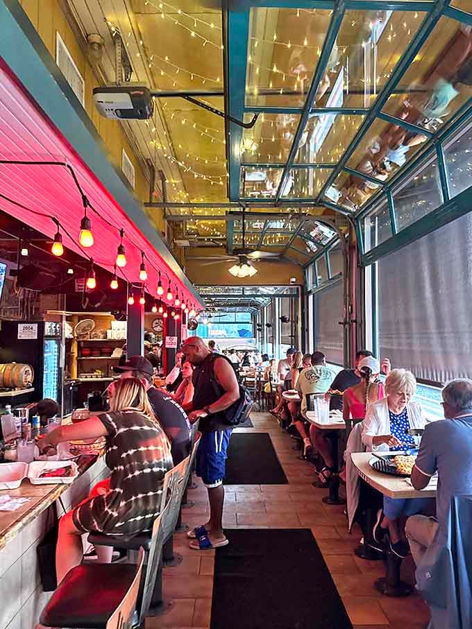 Rustic charm meets breakfast heaven inside, where wood-paneled walls adorned with vintage hunting gear create the perfect pancake-eating atmosphere. 