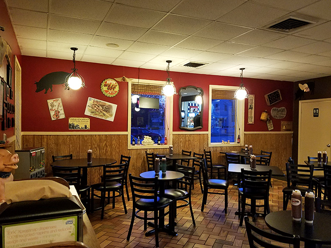 Step inside to a no-frills dining room where red walls and wood paneling set the stage for the real star: what's coming out of those smokers.