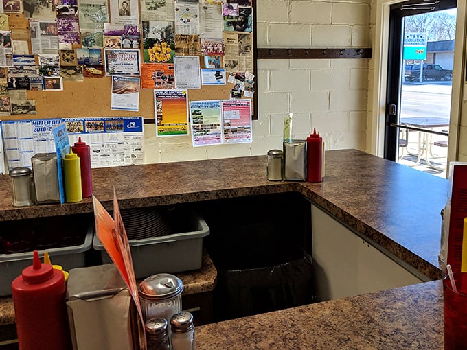 Inside Wally's, the order counter tells stories of community through its bulletin board &ndash; a small-town time capsule with condiments.