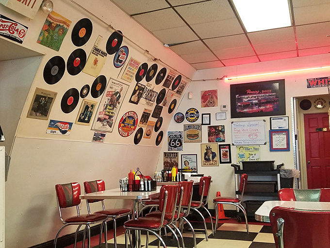 Vinyl booths and vintage records transform ordinary walls into a museum of mid-century cool &ndash; dining with a soundtrack of silent memories.