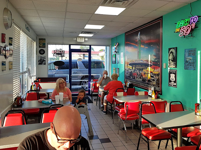 Step inside and the turquoise walls, vintage memorabilia, and cherry-red vinyl seating transport you to a time when rock 'n' roll was young and milkshakes were a food group.