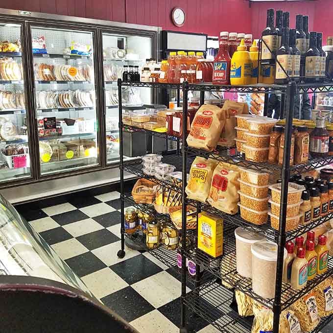 Step into a world where black-and-white floors and red walls create the perfect backdrop for food magic. Grocery shopping never looked so tempting!