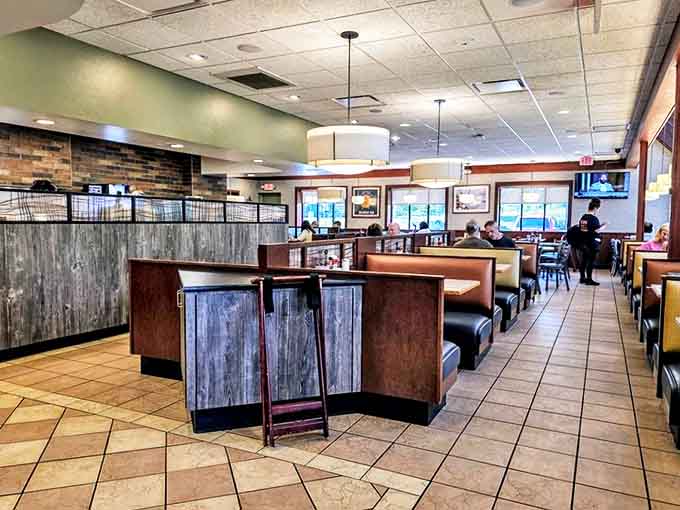 Cozy booths and warm lighting create the perfect backdrop for pancake indulgence &ndash; comfort food deserves a comfortable setting.