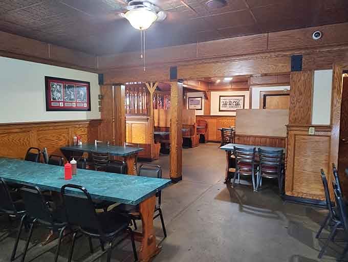 The warm wood tones and no-nonsense seating tell you everything you need to know: this is where serious eating happens without any pretense.