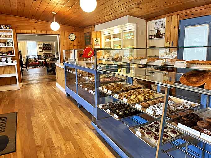 Warm pine-paneled walls and gleaming display cases create the perfect backdrop for the bakery's edible treasures – Scandinavian coziness at its finest.