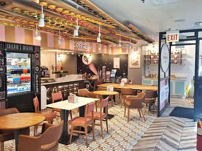 Inside Stan's, pink and gold stripes create a retro-chic wonderland where donuts dangle from the ceiling like edible art installations.