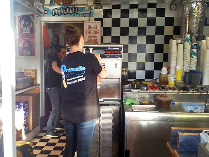 Behind the counter, where magic happens daily. The classic black-and-white checkered wall speaks volumes about Dreamette's commitment to timeless simplicity.