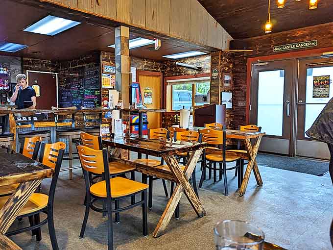 Rustic charm meets barbecue serious business inside Smoke, where wooden tables and warm lighting create the perfect stage for meat-centric magic.