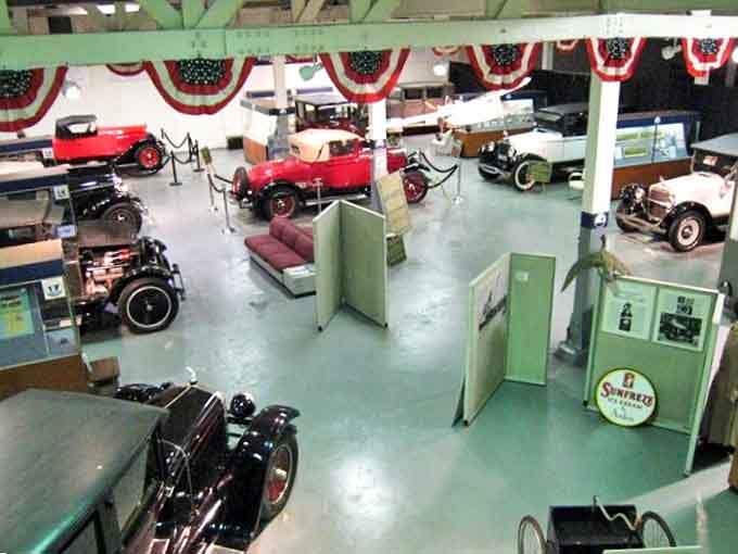 Inside the museum, history comes alive with meticulously preserved automobiles arranged like mechanical time capsules from America's golden automotive age.