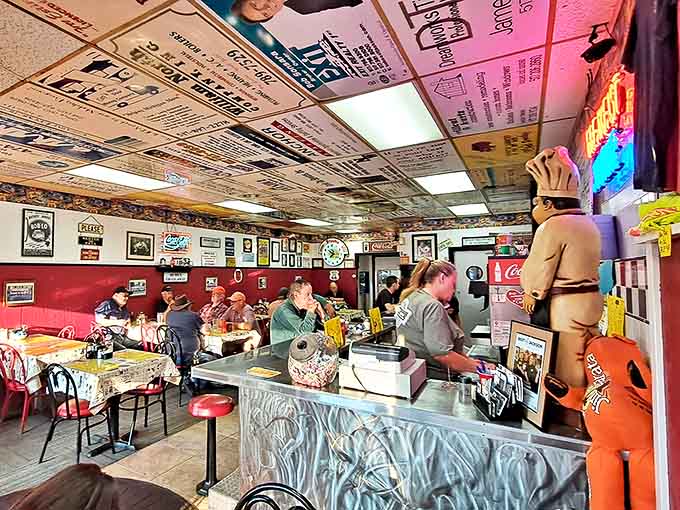 Business cards wallpaper the ceiling like a community bulletin board, while diners huddle over plates of comfort food in this Jackson institution.