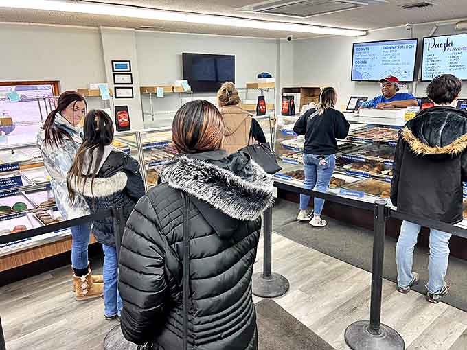 Morning pilgrims line up for their fix of fried gold, a daily ritual that brings together Flint's diverse community.