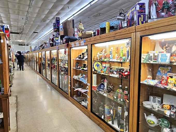 Glass display cases stretch into infinity, each one a miniature museum of memories waiting to be rediscovered and rehomed.