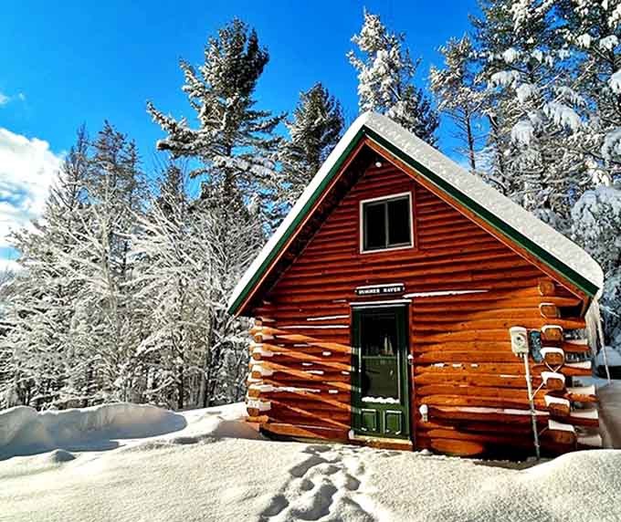This log cabin doesn't just sit by the lake &ndash; it practically tells stories through its weathered wood and welcoming porch.