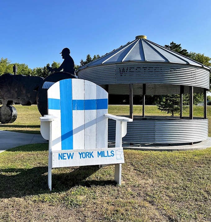 An Adirondack chair sporting the Finnish flag colors and "NEW YORK MILLS" lettering &ndash; because nothing says "Minnesota" quite like Finnish heritage.