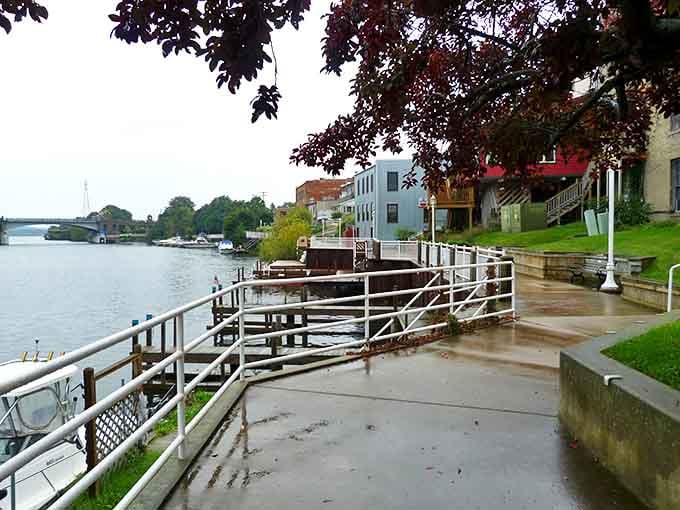 Manistee's Riverwalk invites leisurely strolls with its gentle curves and peaceful waters &ndash; nature's antidote to the digital age.