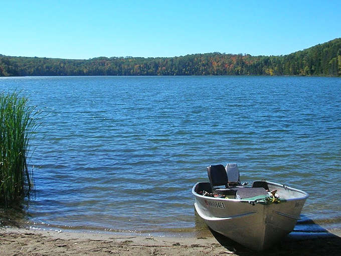 Mother Nature showing off again! The pristine shoreline of La Salle Lake creates a perfect mirror image of Minnesota's brilliant blue skies.