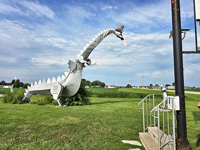 A side view reveals the dragon's impressive 35-foot length, with its gracefully curved neck and detailed spinal ridges catching the midday light.