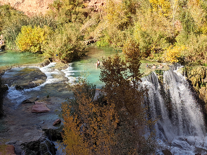 The desert's secret: Turquoise waters wind through the canyon landscape, offering a refreshing contrast to Arizona's typically arid scenery.
